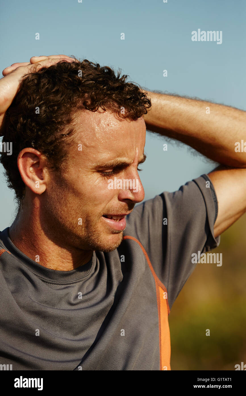 Hands behind head hi-res stock photography and images - Alamy