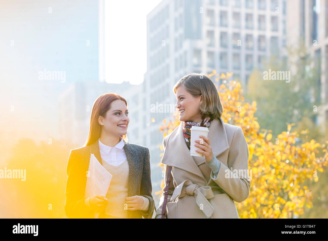 Woman walking park coffee in hi-res stock photography and images - Alamy