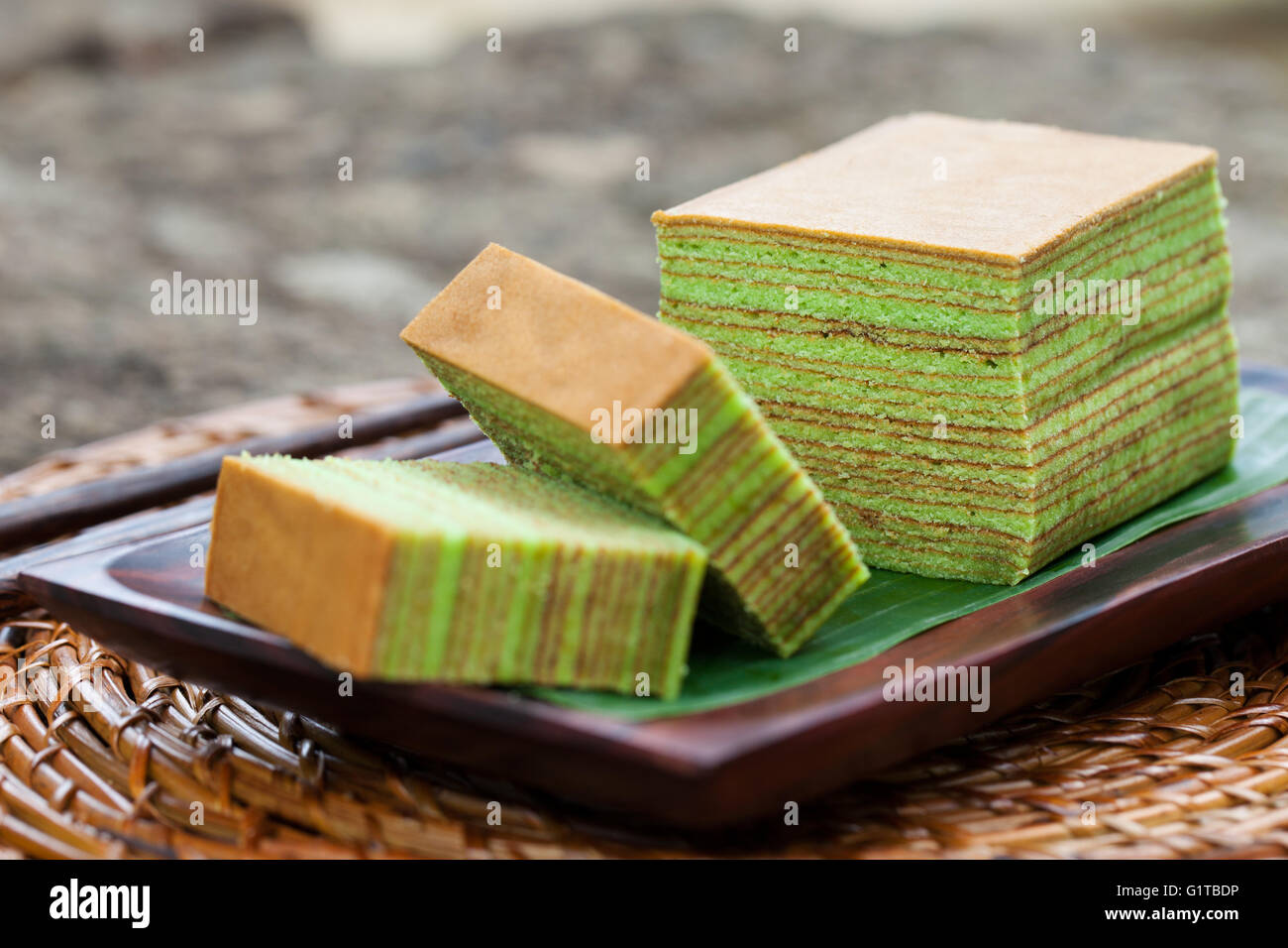 Traditional Indonesian sweet Lapis layer cake on a wooden background ...