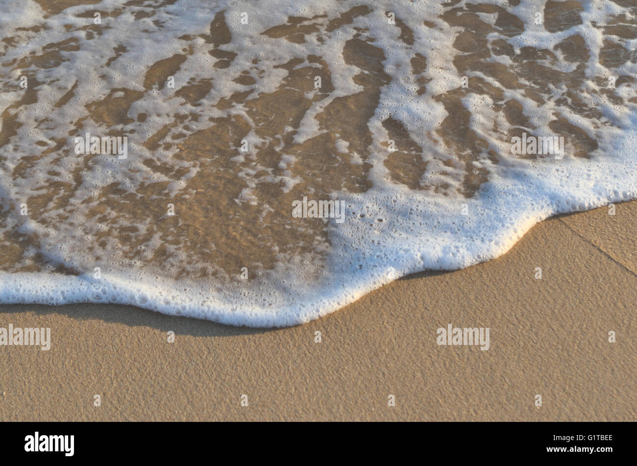 Close up shot of beach waves coming. Summertime and vacation ...