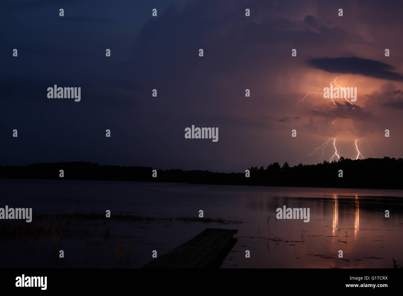 Storm with lightning at night Stock Photo - Alamy
