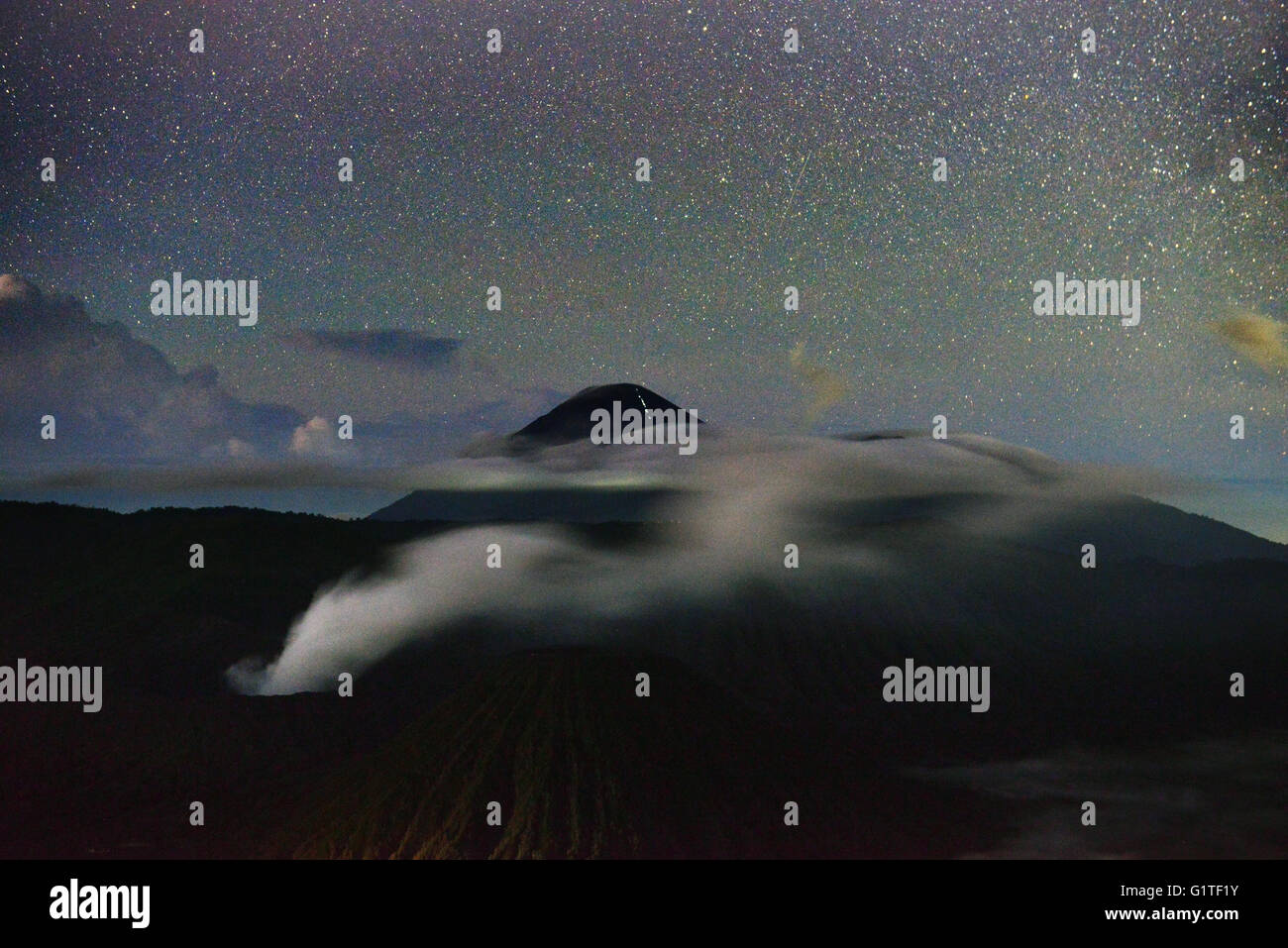 The smoking Gunung Bromo volcano & Semeru volcano under the stars at ...