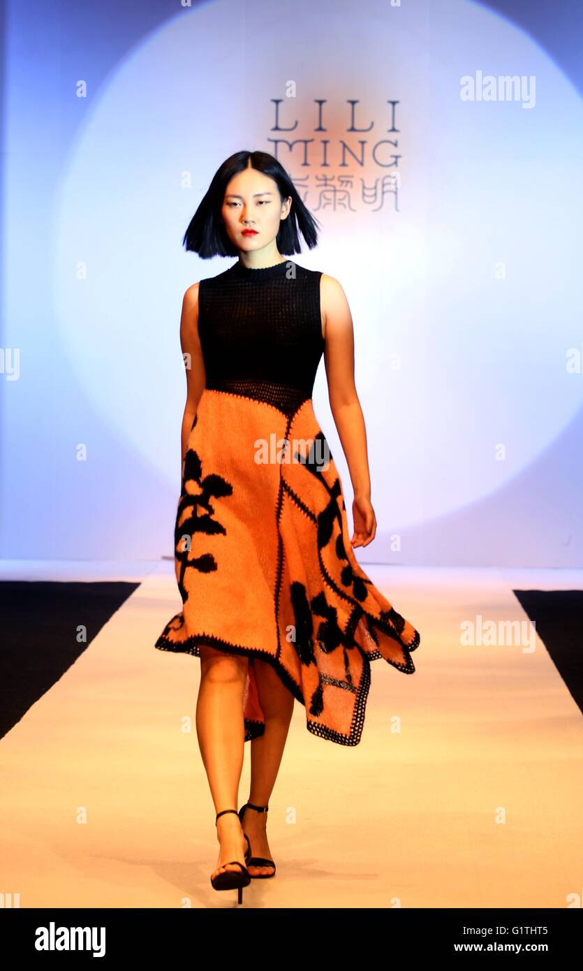 Shanghai, China. 18th May, 2016. A model presents a creation designed ...