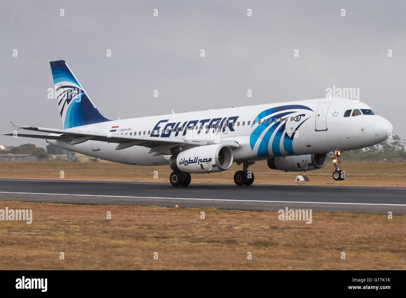 An EgyptAir Airbus A320 takes off from the runway at Jomo Kenyatta ...