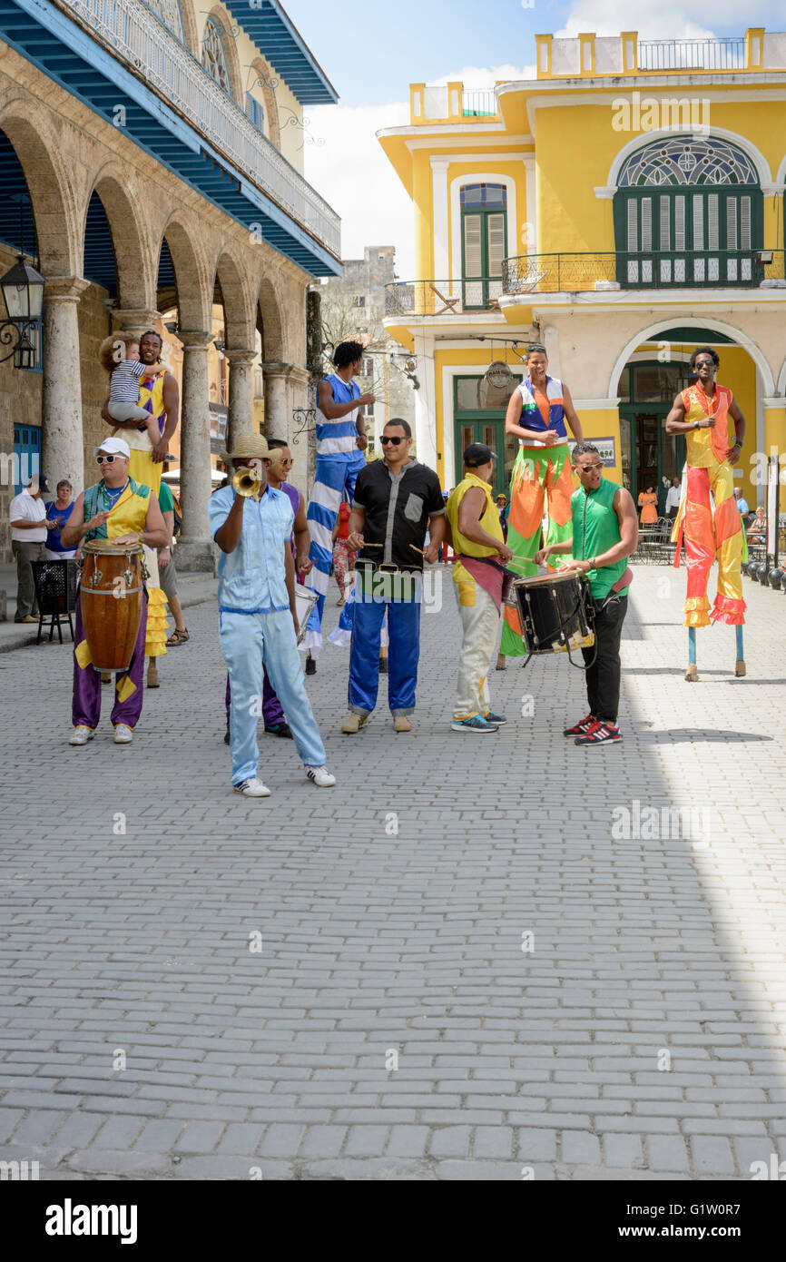 Street performers dancing on stilts in Plaza Vieja (Old Square), Habana ...