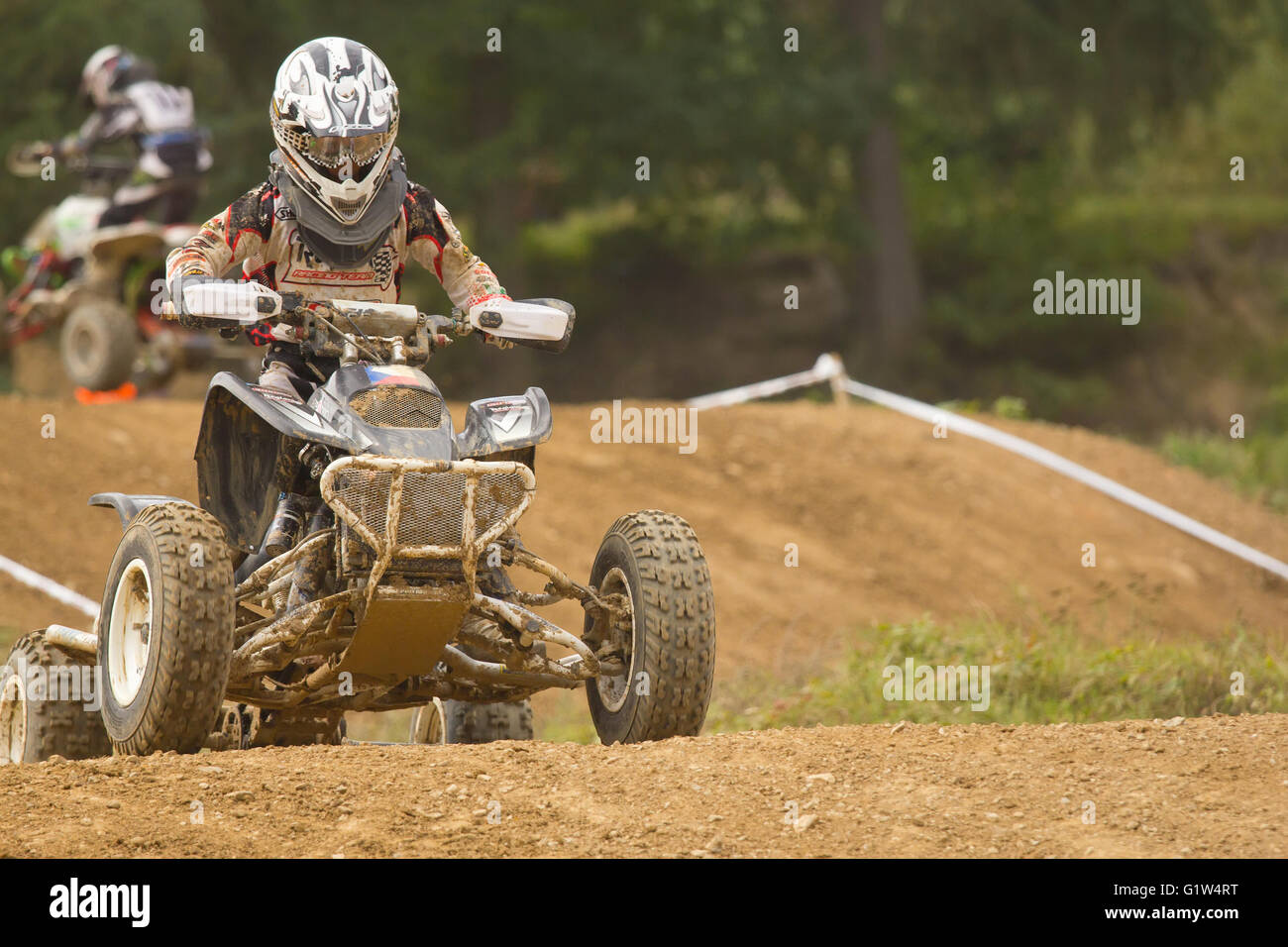 Detailed view of the quad rider on the track Stock Photo - Alamy