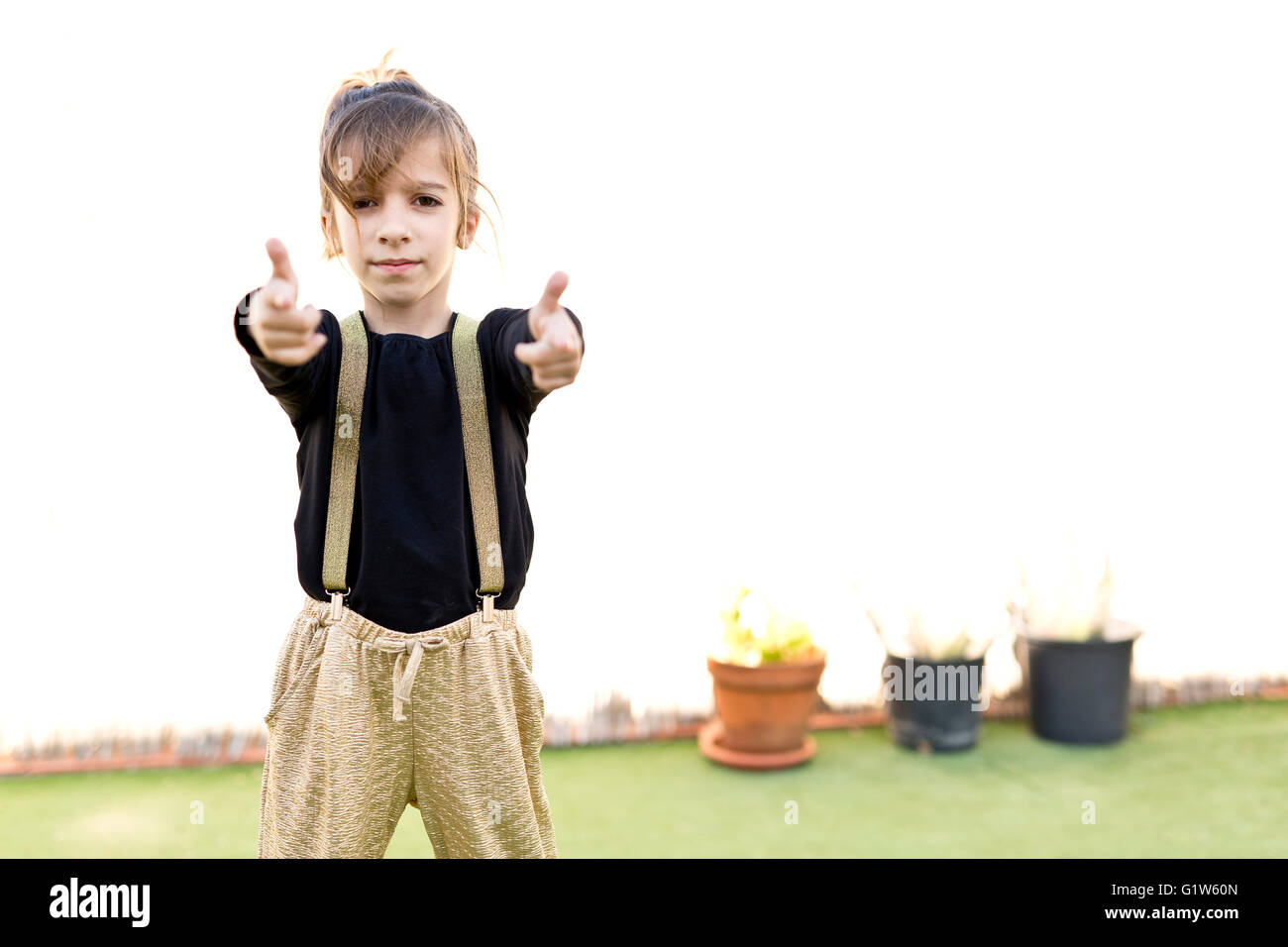 Girl posing for photos with a disguise Stock Photo - Alamy