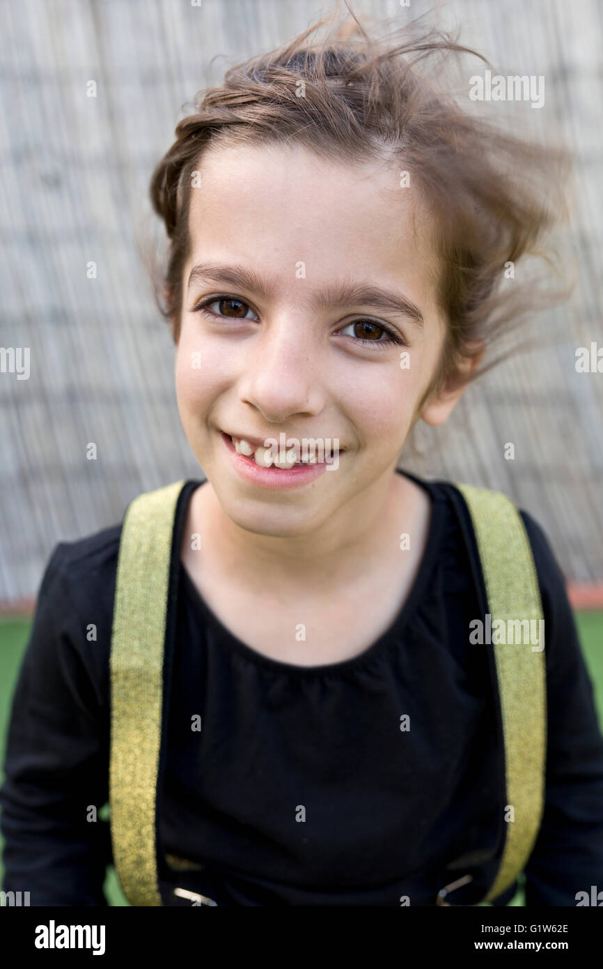 Girl posing for photos with a disguise Stock Photo - Alamy