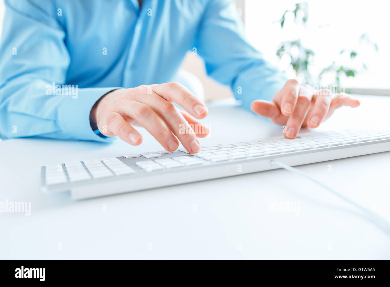 Male hands or men office worker typing on the keyboard Stock Photo - Alamy