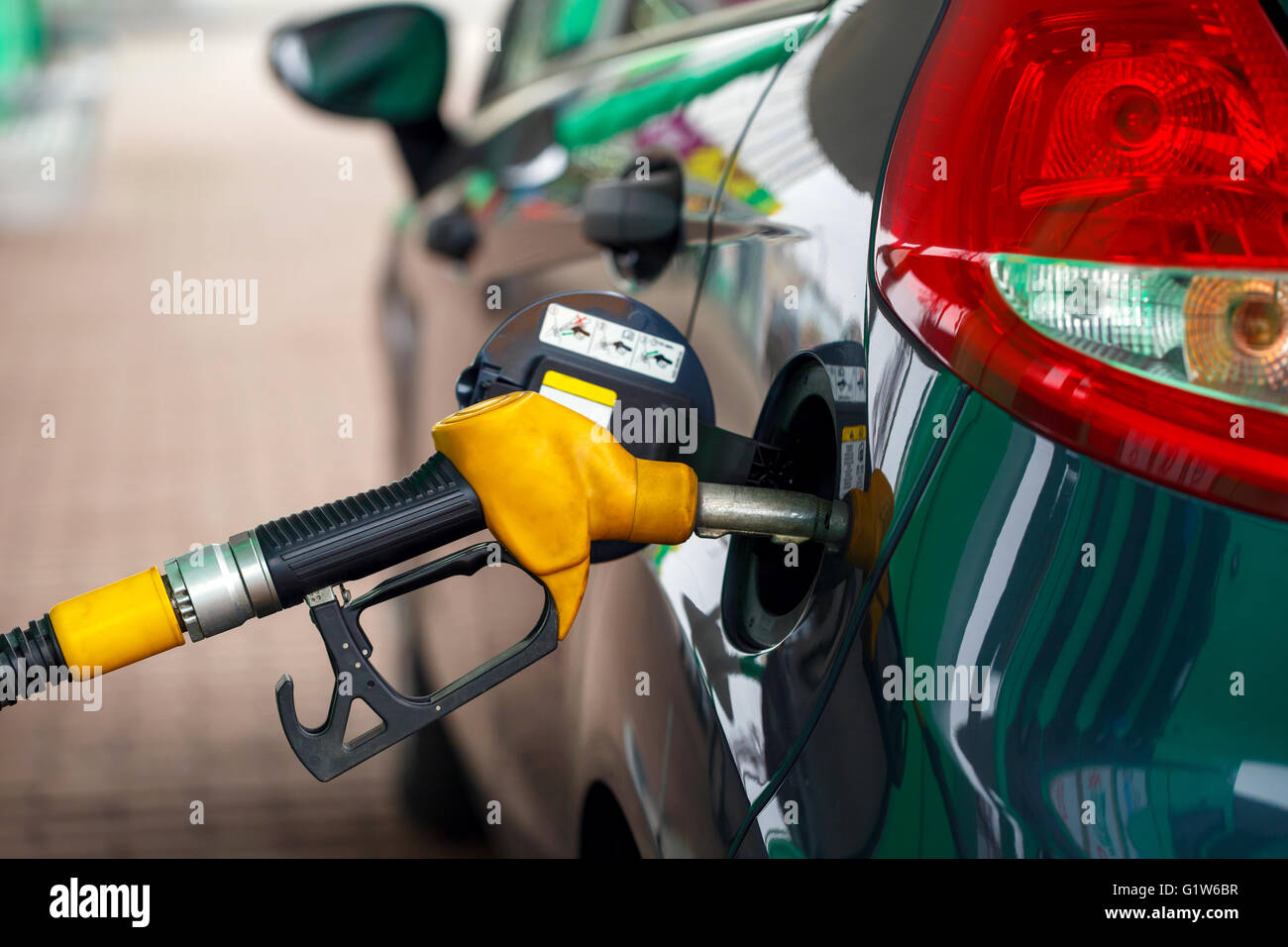 Car refueling on a petrol station closeup Stock Photo - Alamy