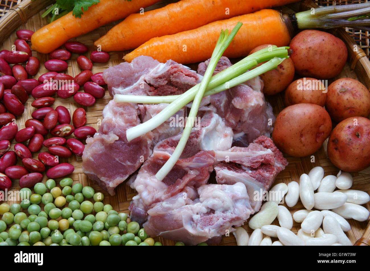 Vietnamese food, vegetable soup, fresh ingredients: potato, green pea ...