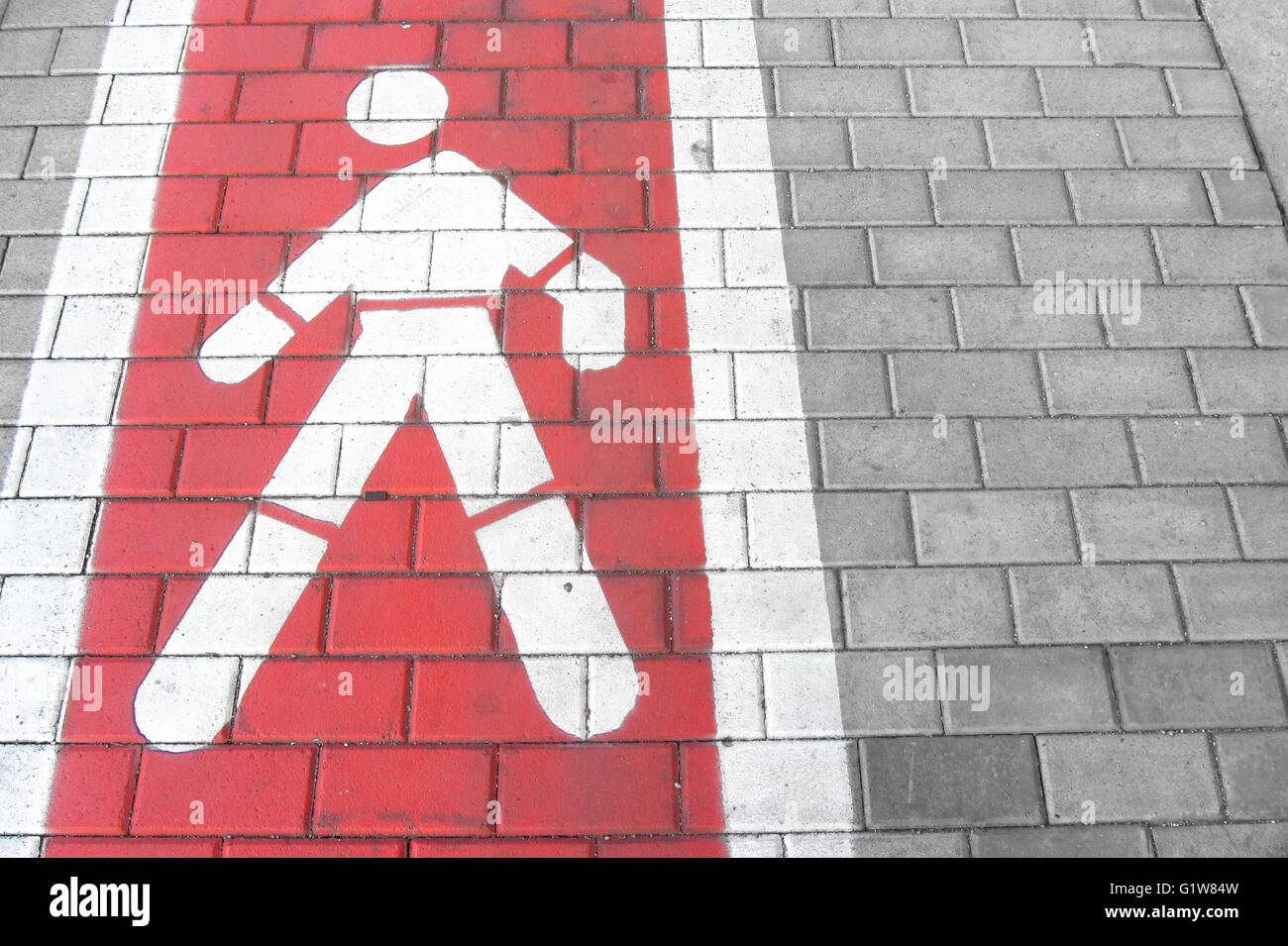 red pedestrians lane along a sidewalk Stock Photo - Alamy