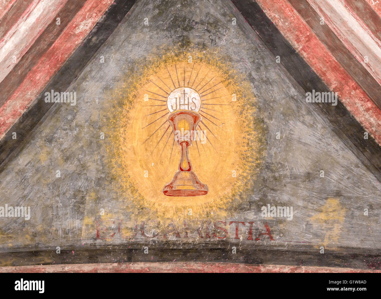 A fresco depicting the sacred chalice of Jesus. "Eucaristia" in Italian ...