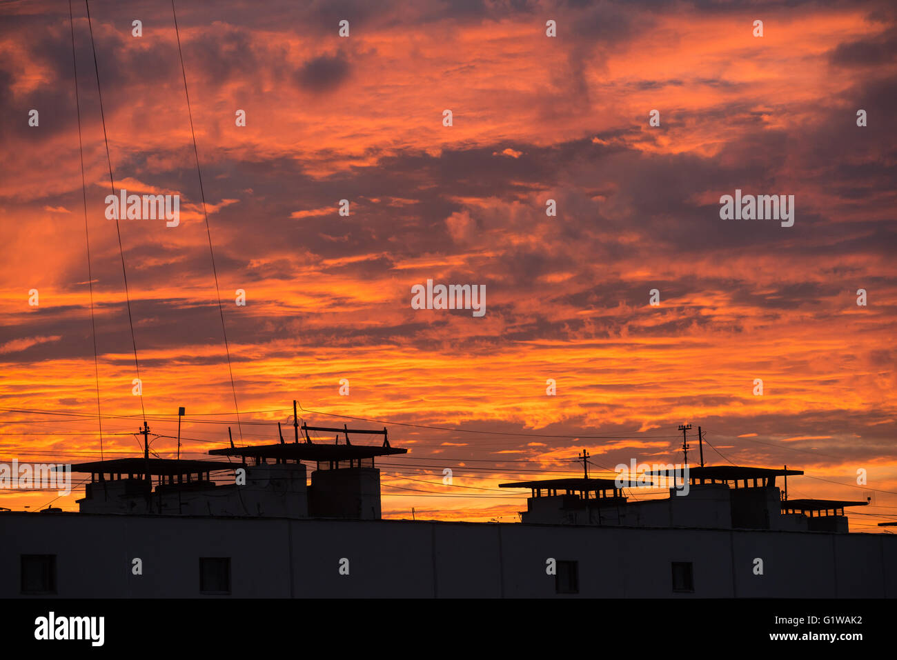 Natural background of colorful red sky during sunset time with street ...