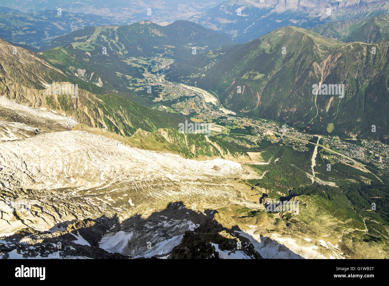 Foggy summer landscape with Chamonix aerial view and mountains in Mont ...