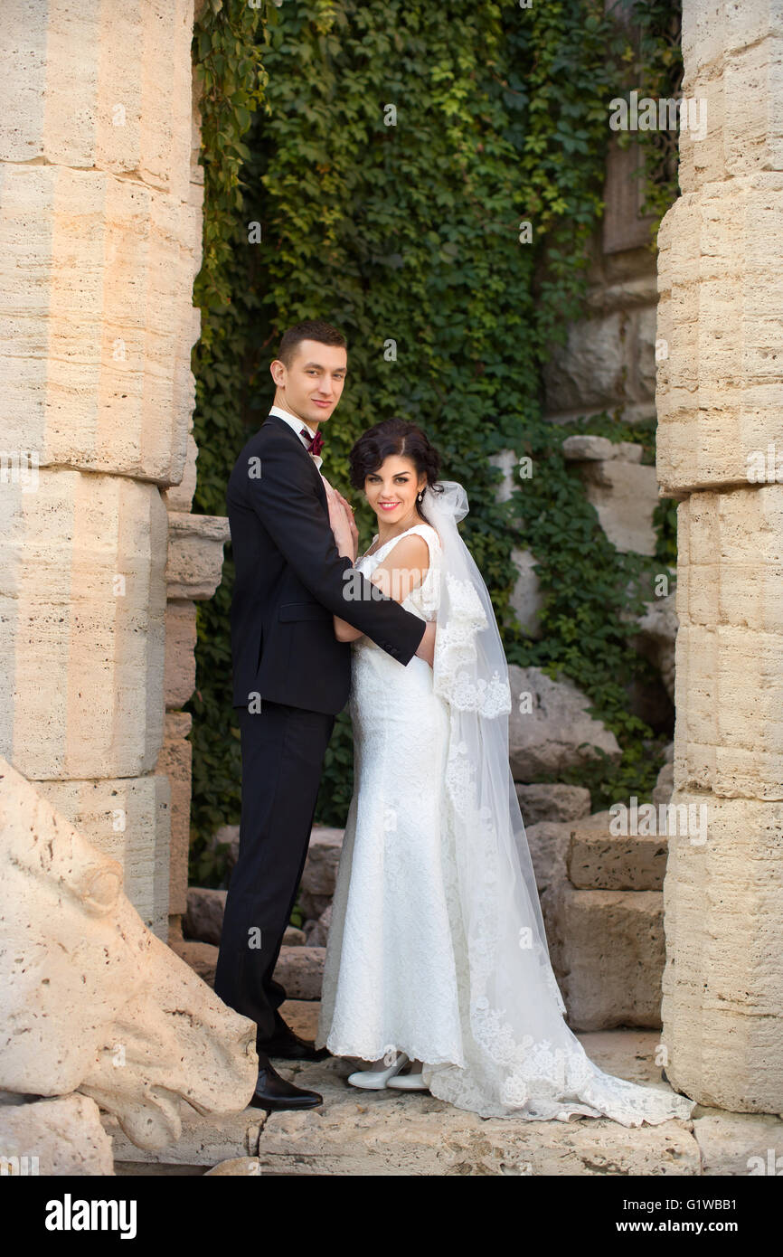 Beautiful bride and groom. Just merried Stock Photo - Alamy