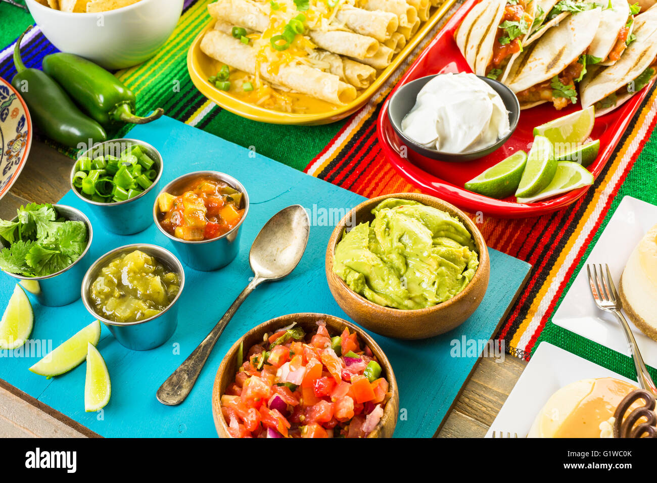 Fiesta party buffet table with traditional Mexican food Stock Photo - Alamy
