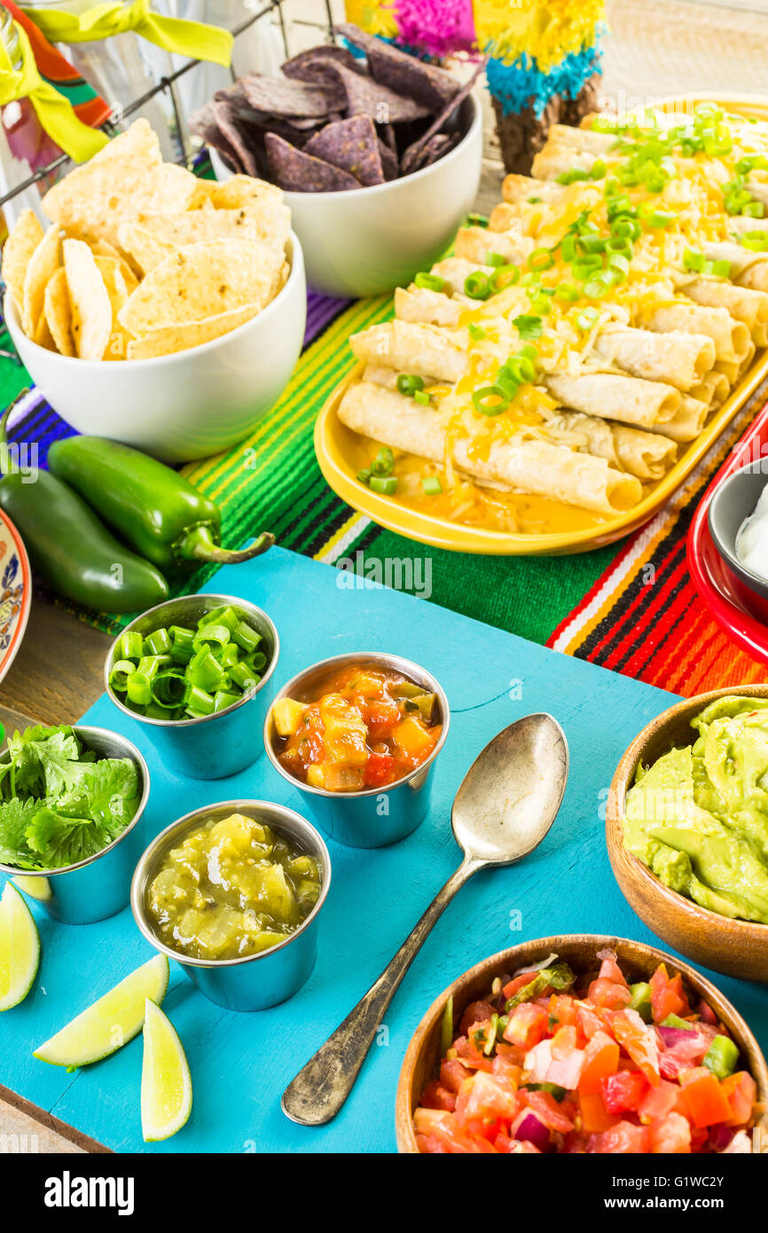 Fiesta party buffet table with traditional Mexican food Stock Photo - Alamy