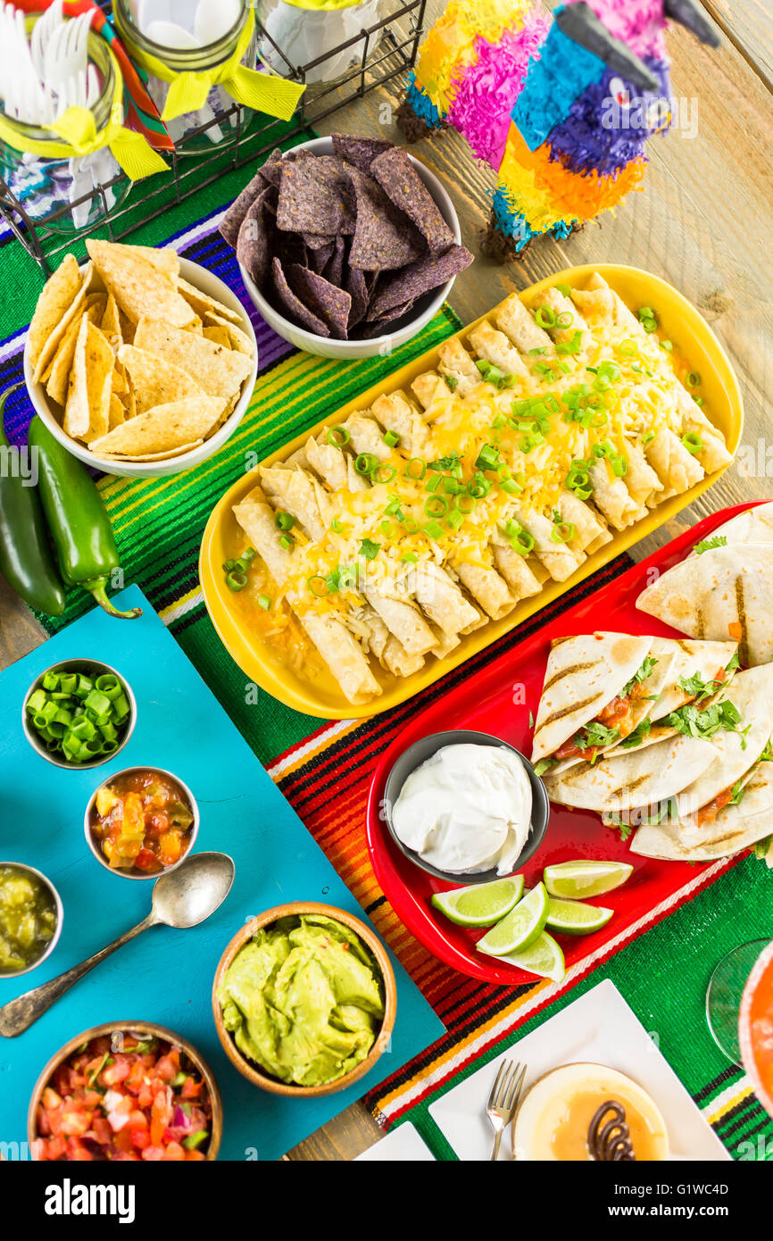 Fiesta party buffet table with traditional Mexican food Stock Photo - Alamy