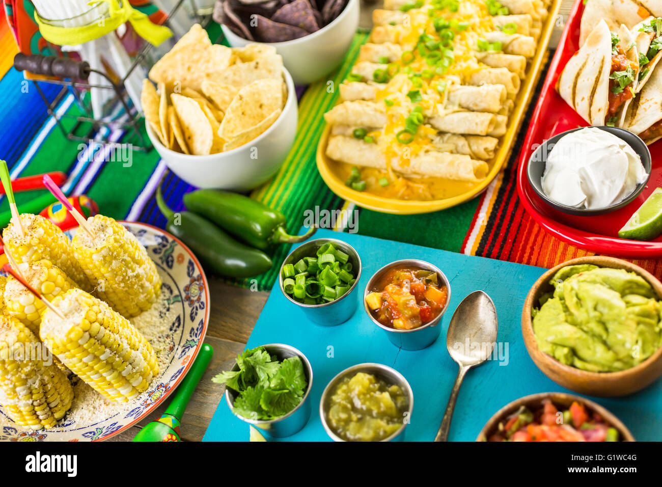 Fiesta party buffet table with traditional Mexican food Stock Photo - Alamy
