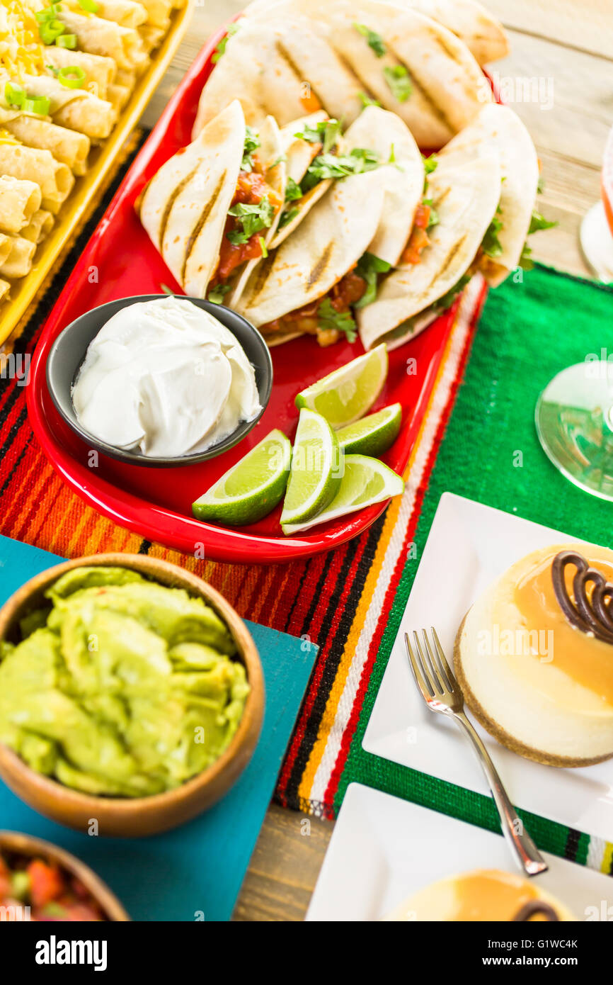 Fiesta party buffet table with traditional Mexican food Stock Photo - Alamy