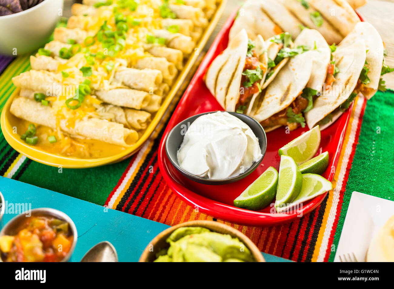 Fiesta party buffet table with traditional Mexican food Stock Photo - Alamy