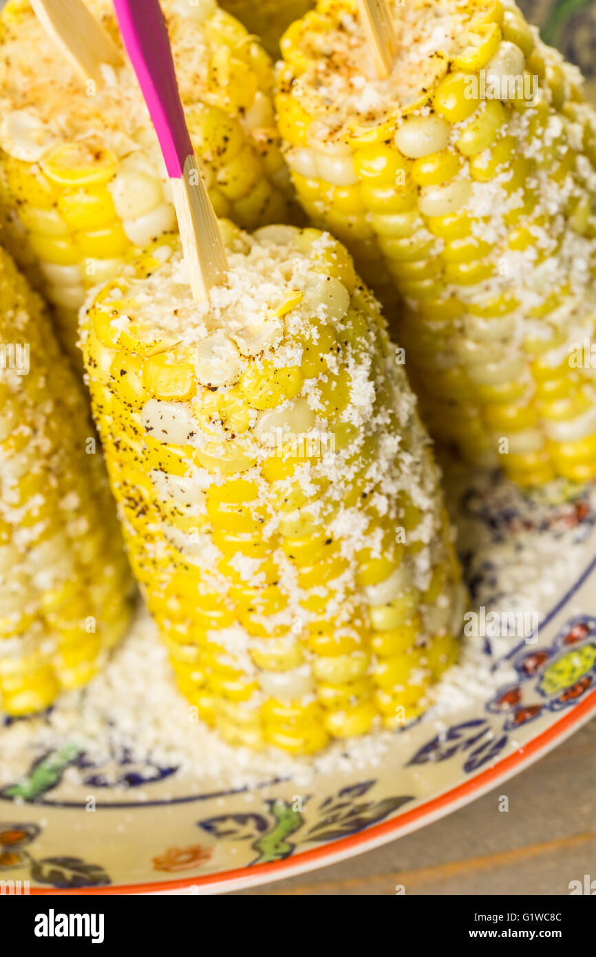 Fiesta party buffet table with spicy mexican corn on the cob and other ...