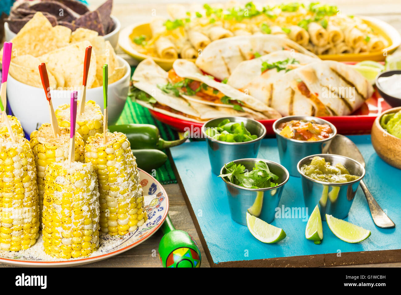 Fiesta party buffet table with traditional Mexican food Stock Photo - Alamy