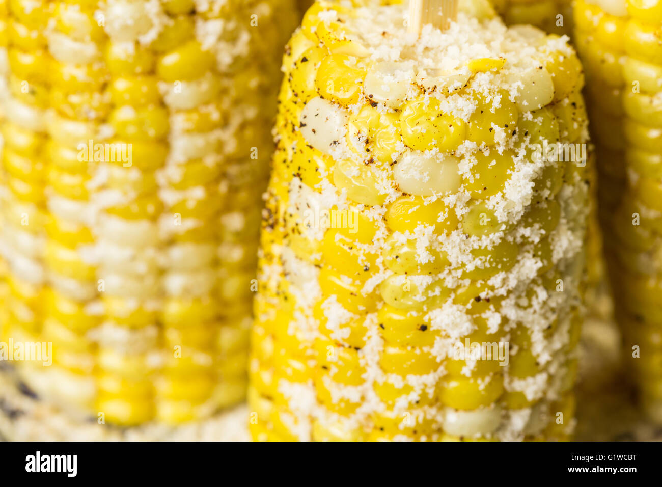Fiesta party buffet table with spicy mexican corn on the cob and other ...