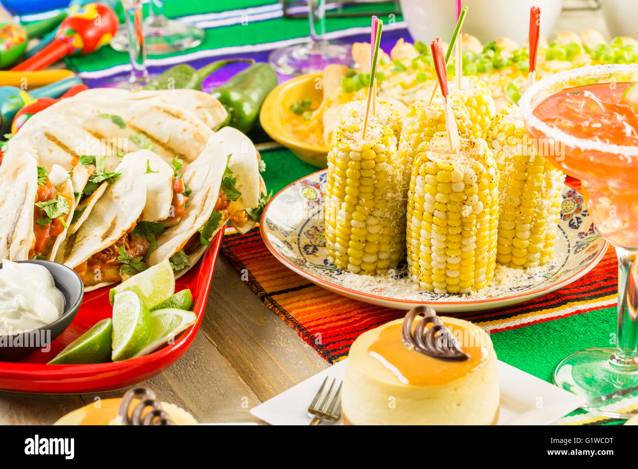 Fiesta party buffet table with traditional Mexican food Stock Photo - Alamy