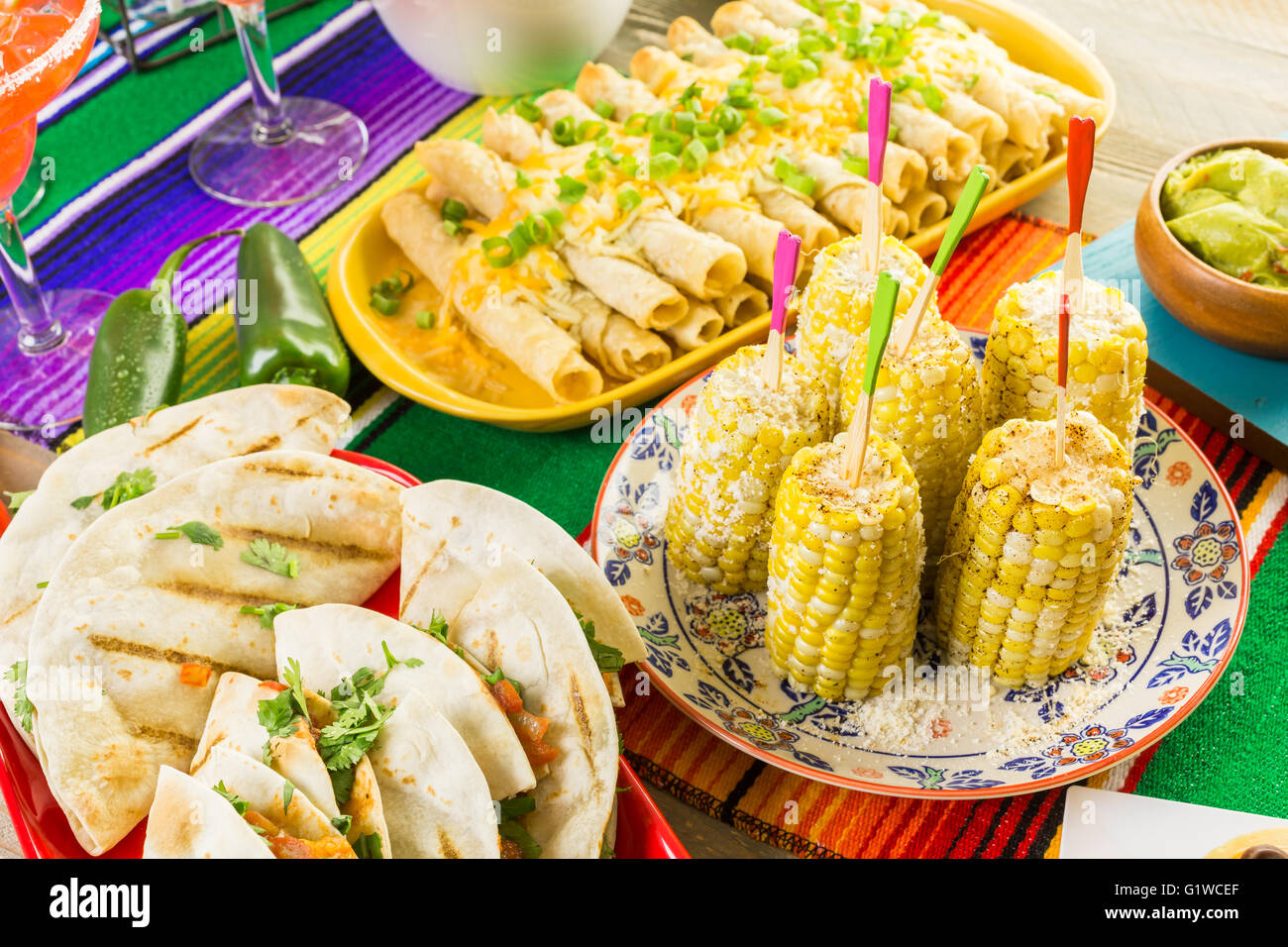Fiesta party buffet table with traditional Mexican food Stock Photo - Alamy