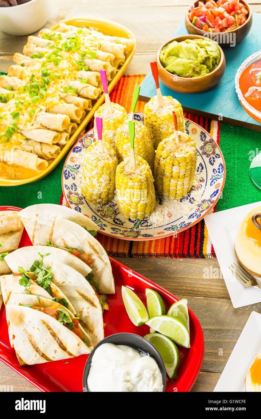 Fiesta party buffet table with traditional Mexican food Stock Photo - Alamy