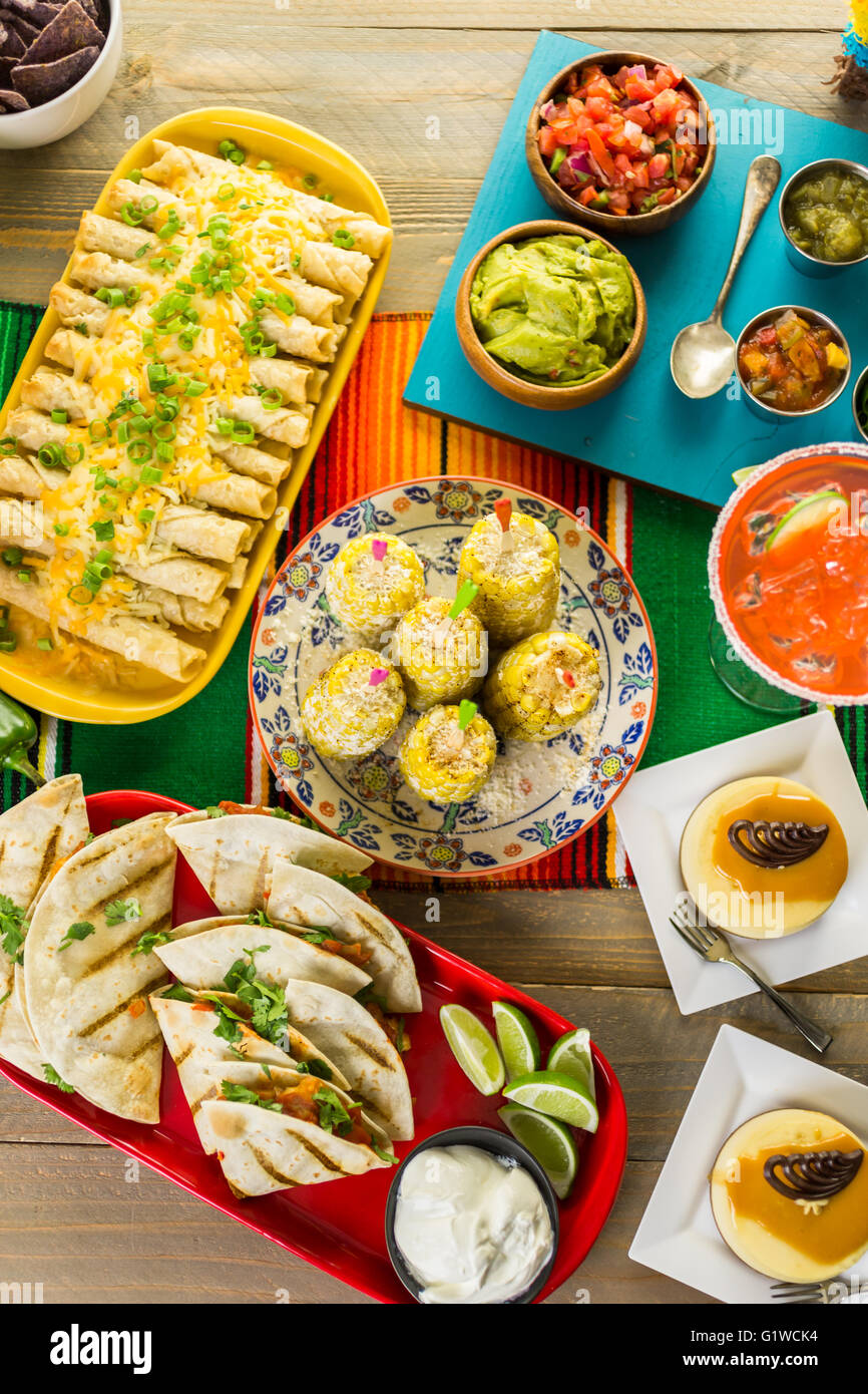 Fiesta party buffet table with traditional Mexican food Stock Photo - Alamy