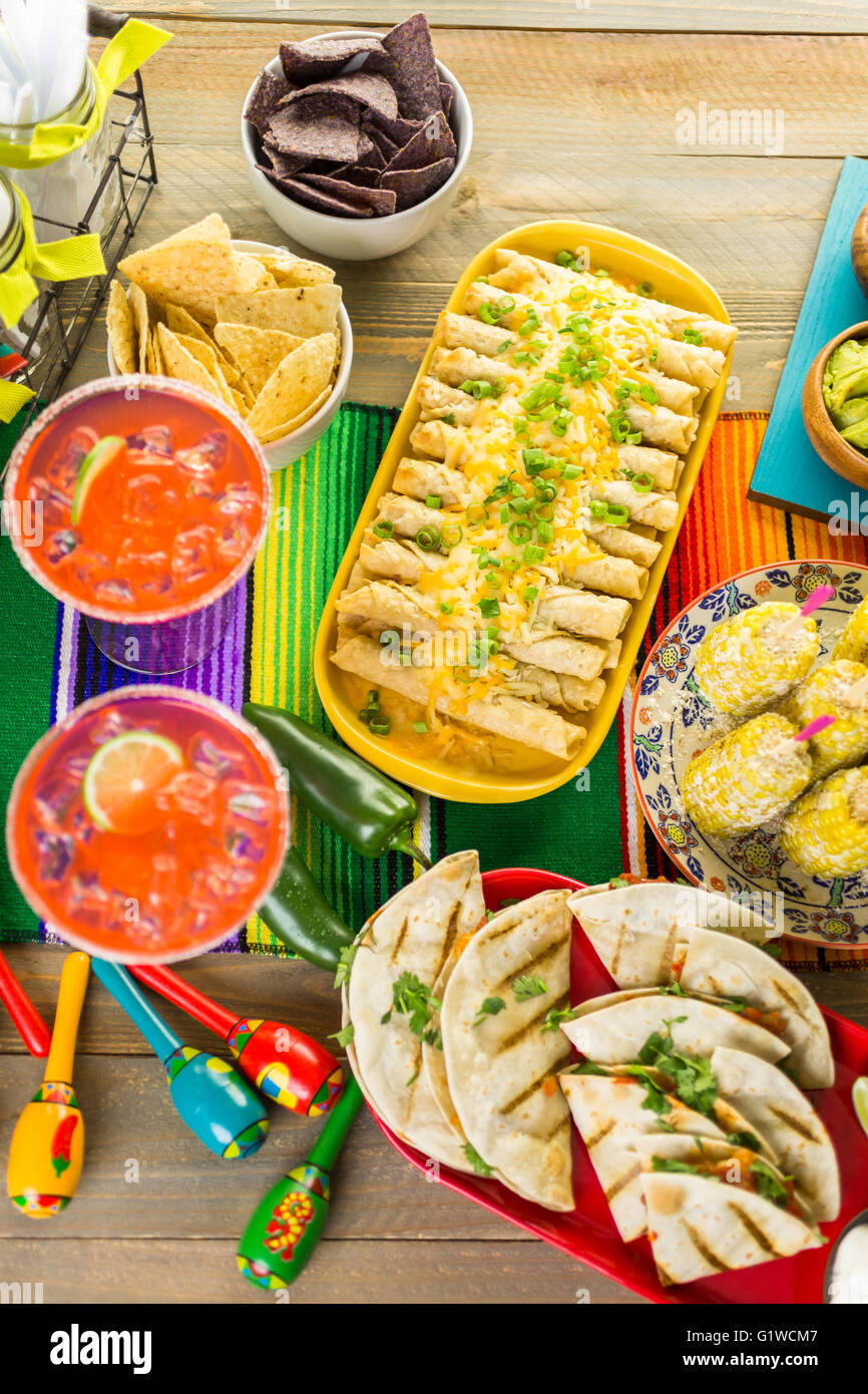 Fiesta party buffet table with traditional Mexican food Stock Photo - Alamy