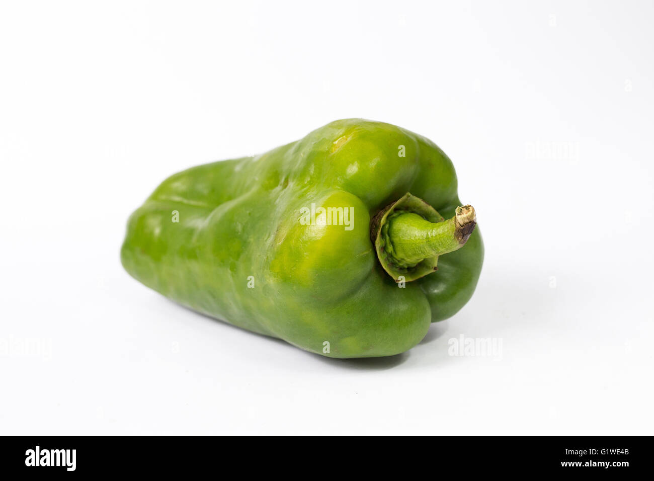 Isolated green peppler in a white background Stock Photo - Alamy