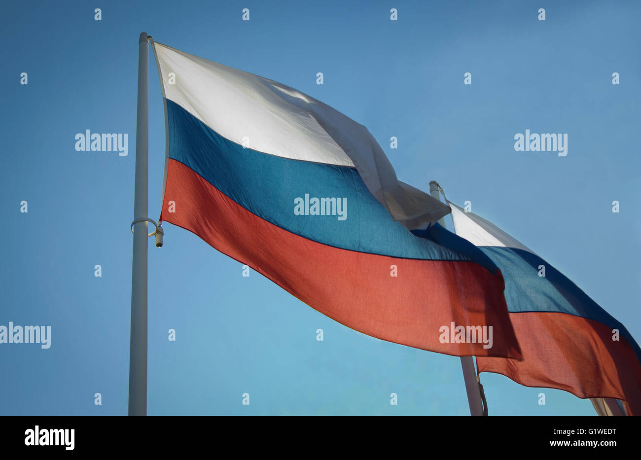 Two Russian flag against of the sky Stock Photo - Alamy