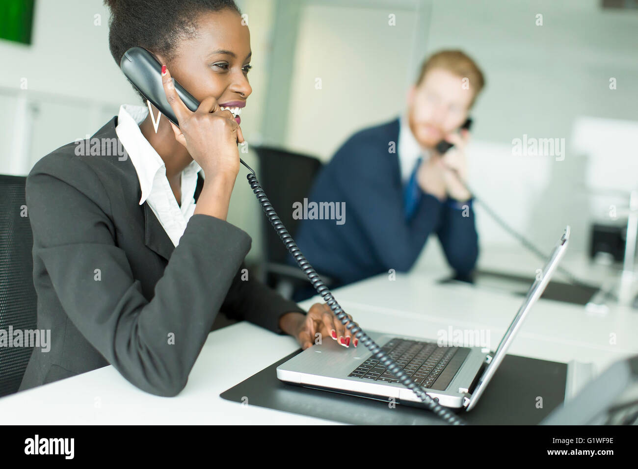 Young business couple working together in the office Stock Photo - Alamy Young business couple working together in the office Stock Photo - Alamy