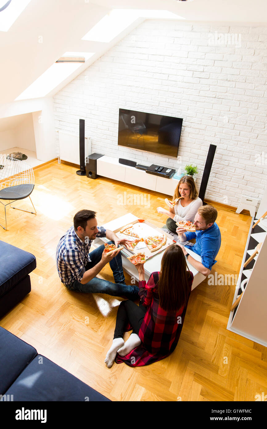 Group friends smiling home hi-res stock photography and images - Alamy
