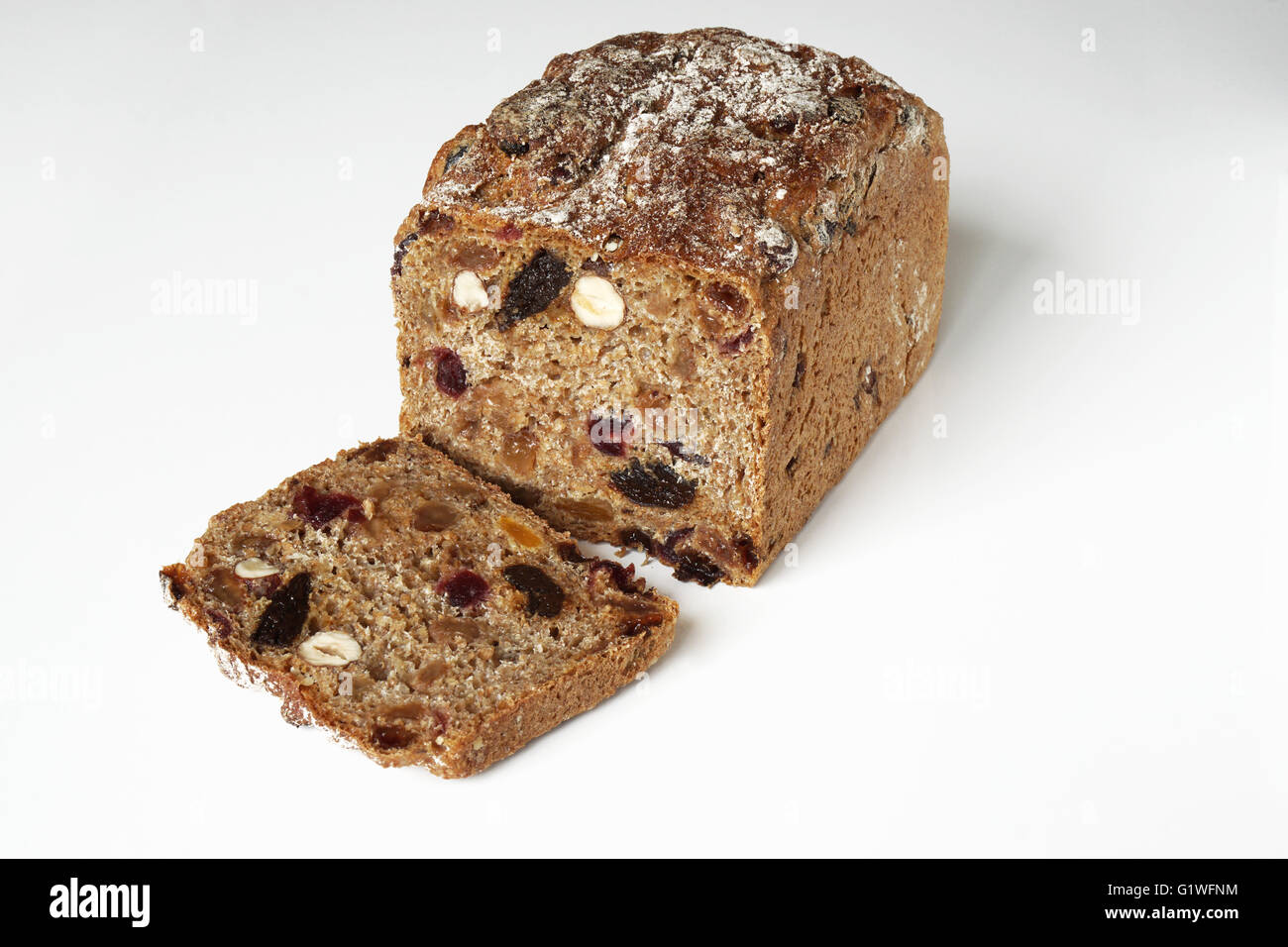 German fruit bread on white Stock Photo - Alamy