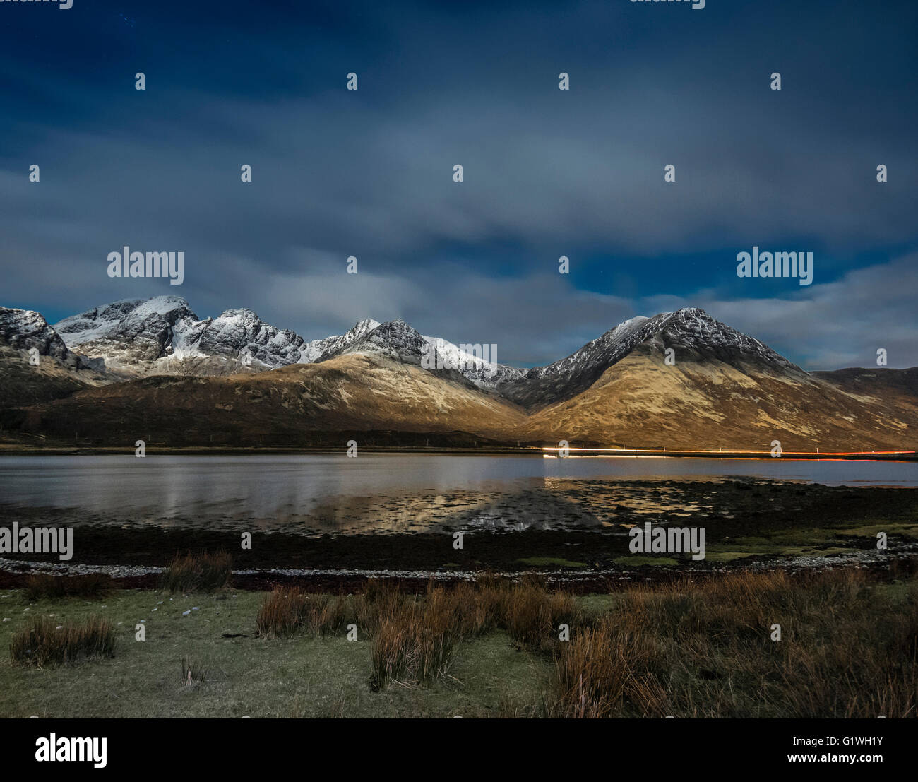 rainbow and stormy skye at isleornsay, skye Stock Photo - Alamy
