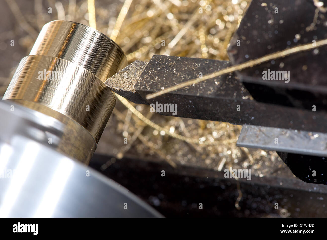 brass detail of is processed on a lathe Stock Photo - Alamy