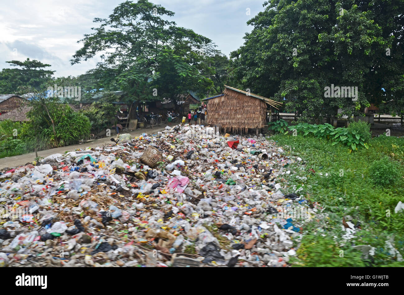 A huge pile of litter beside the railway line on the outskirts of ...