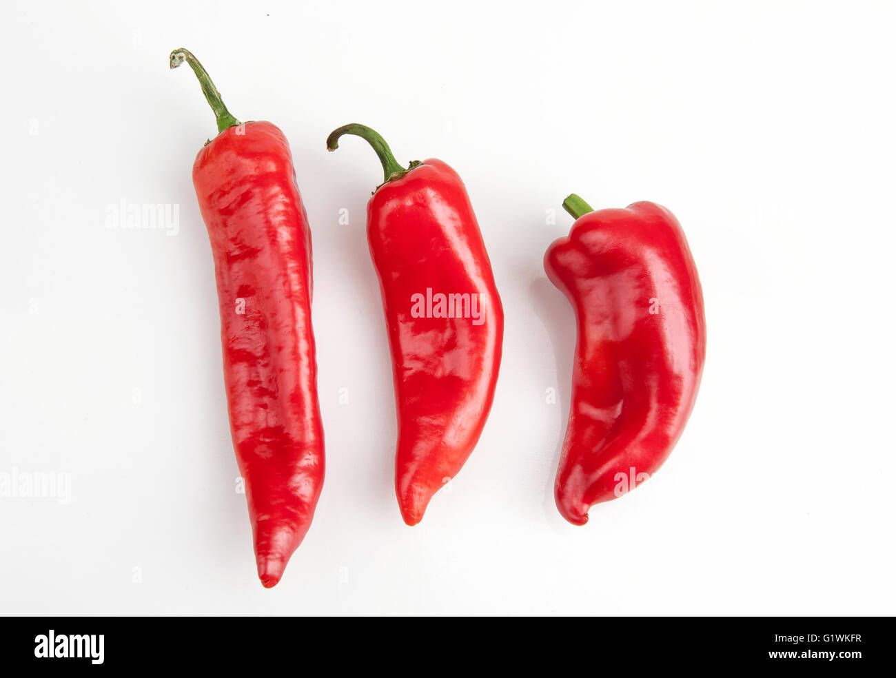 Three whole red bell hi-res stock photography and images - Alamy