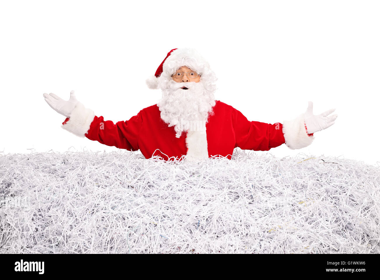 Confused Santa Claus stuck in a pile of shredded paper isolated on ...
