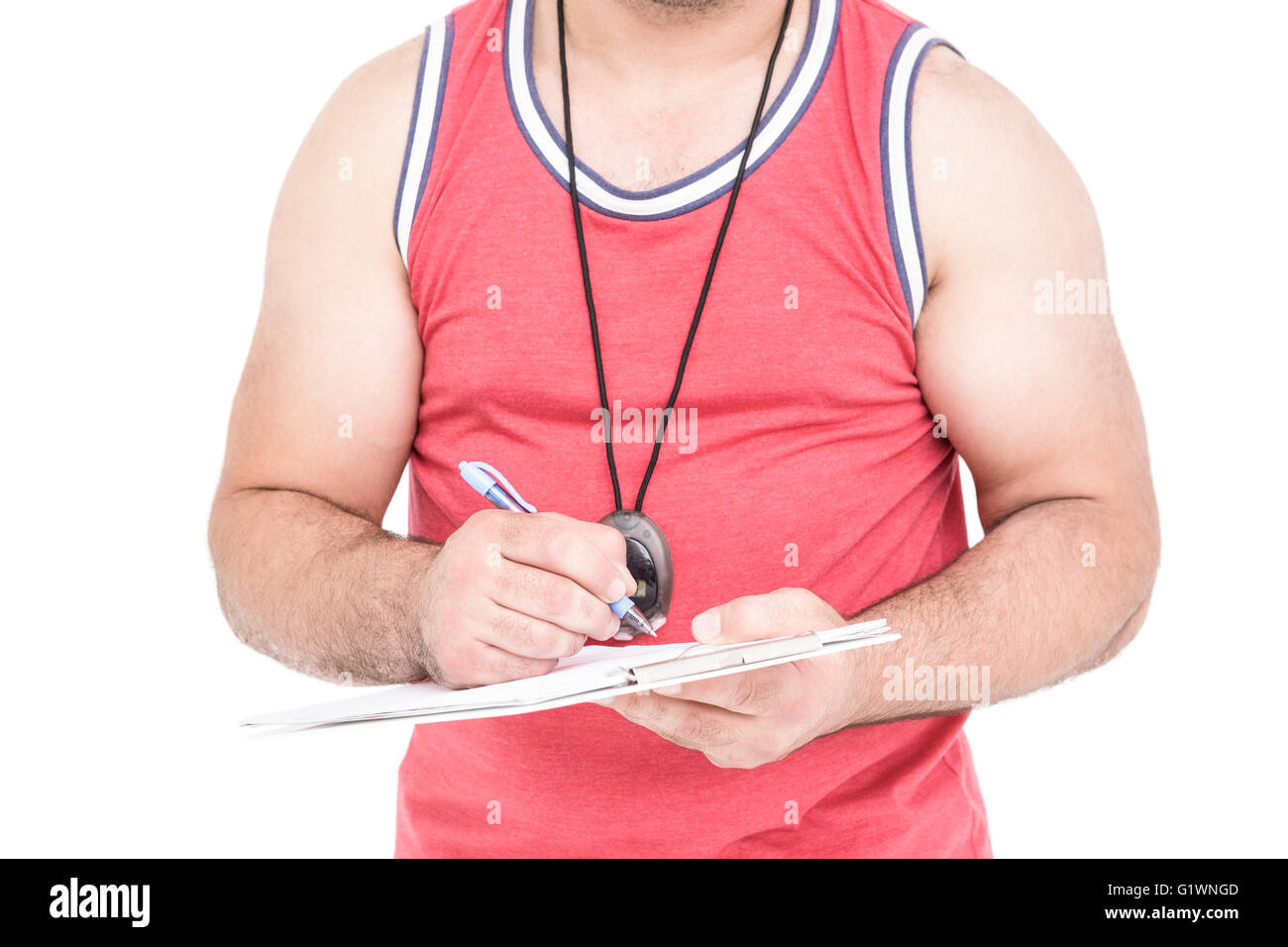 Athlete writing on clipboard Stock Photo - Alamy