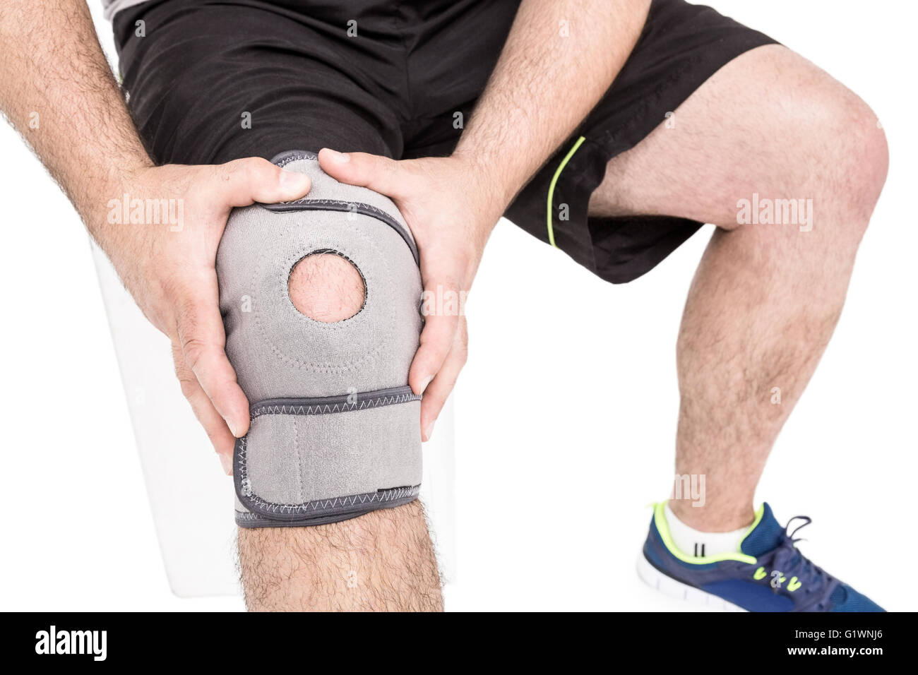 Athlete wearing knee pad Stock Photo - Alamy