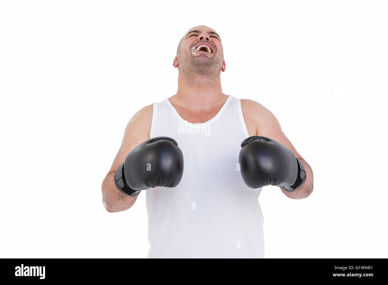 Boxer in boxing gloves laughing Stock Photo - Alamy