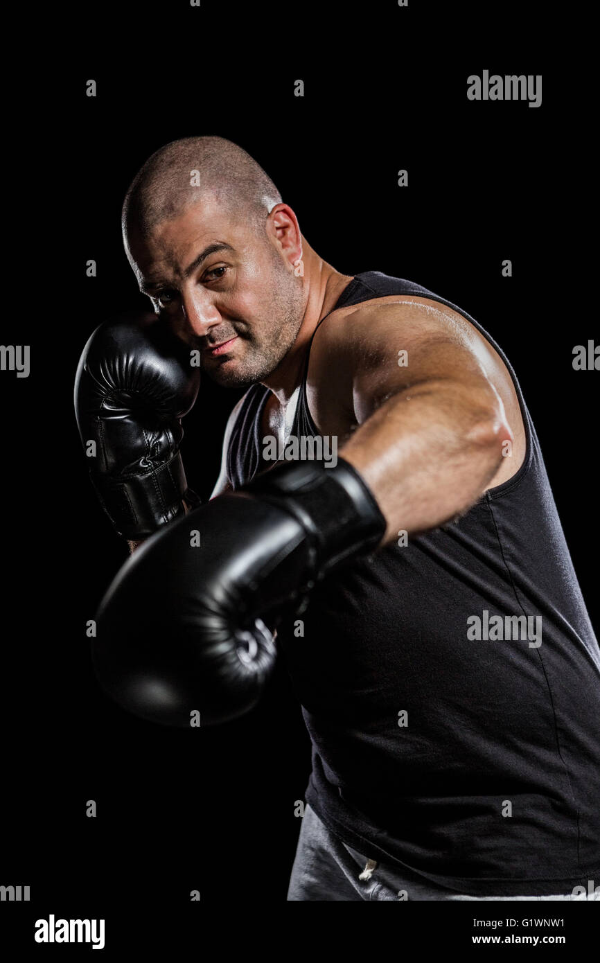 Boxer performing a right hook Stock Photo - Alamy