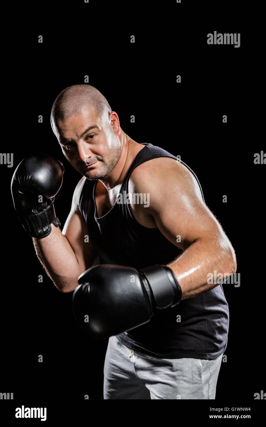Boxer performing boxing stance Stock Photo - Alamy