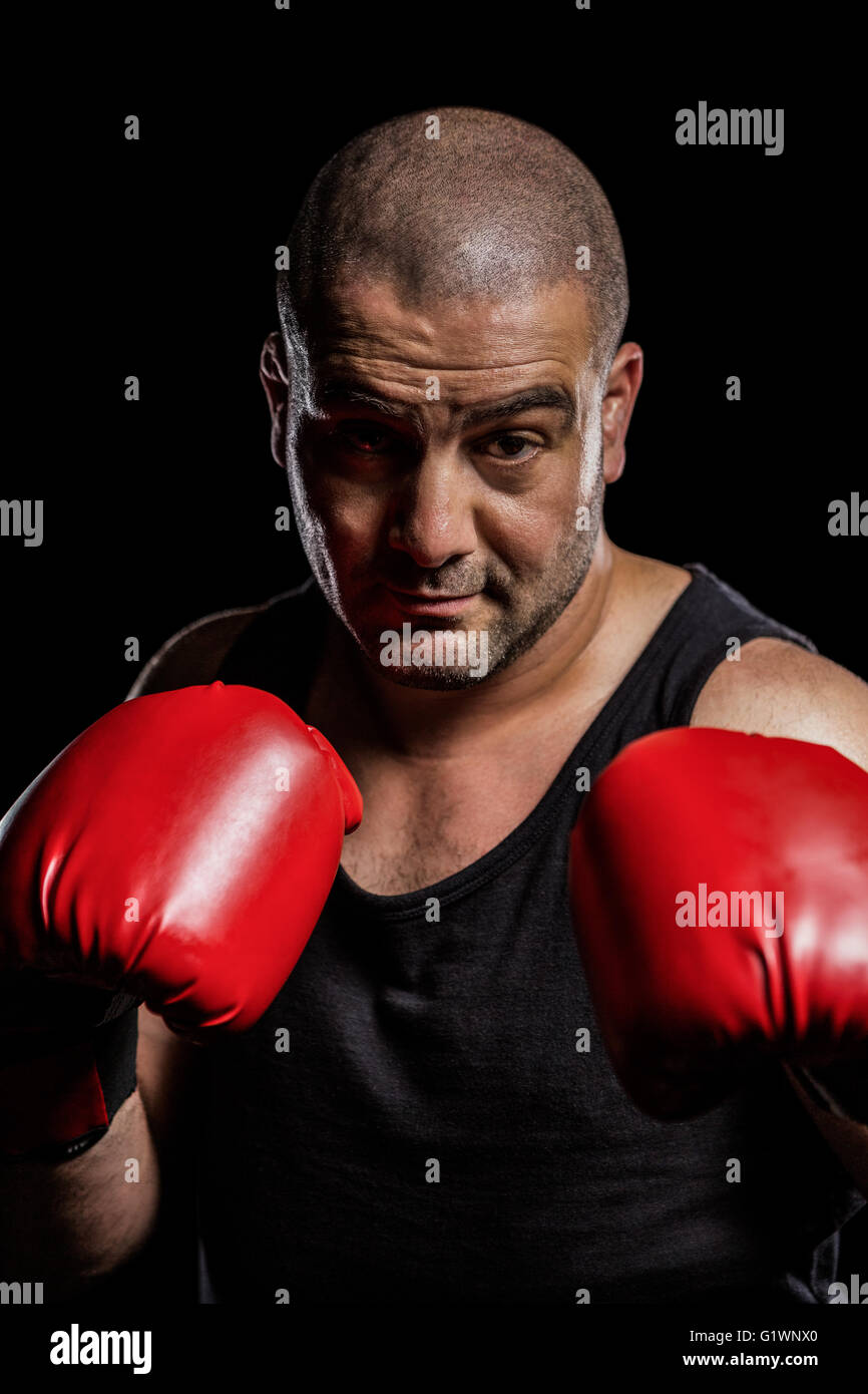 Boxer performing boxing stance Stock Photo - Alamy